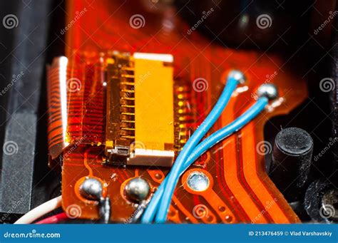Flat Ribbon Cable Isolated On White Flat Connector With Golden Pins
