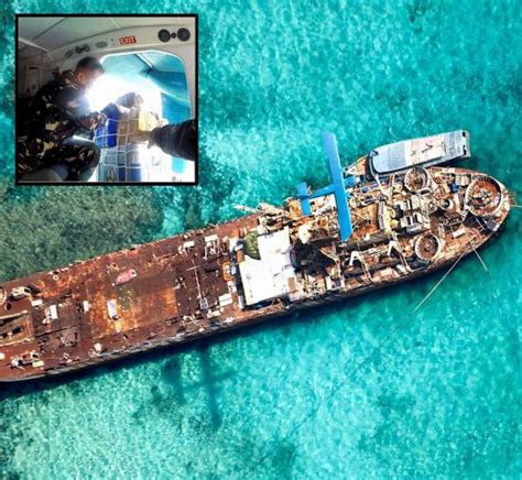 組圖：菲律賓出動飛機為侵佔仁愛礁軍艦補給 軍事 人民網
