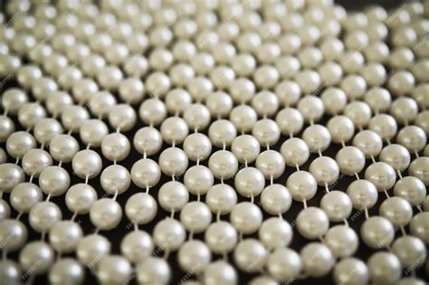 Premium Photo A String Of Pearls Artificial Garland Of Pearls