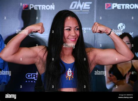 Filipino American Ana Julaton Shows Off Her Muscles During The Onefc