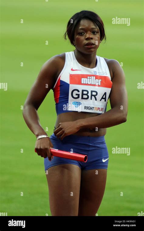 Asha Philip Of Great Britain Runs The First Leg In The Womens 4x100m