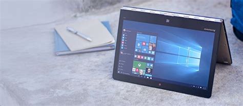 A Windows 10 Pc In Tent Mode Showing Built In Apps And Start Menu