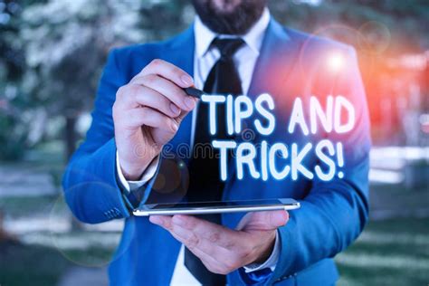 Conceptual Hand Writing Showing Tips And Tricks Business Photo