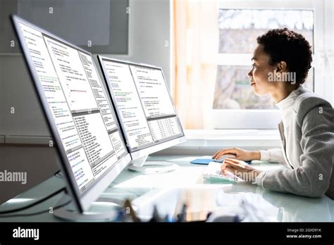 African American Programmer Woman Coding On Computer Stock Photo Alamy