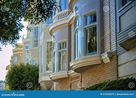 Row Of Decorative Middle Class American Dream House Or Home Facades In