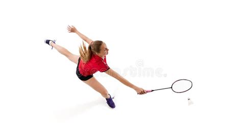 Aerial View Of Female Badminton Player Jumping In Motion To Hit