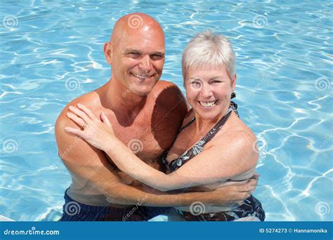 Happy Couple Relaxing By The Pool Stock Image Image Of Male People