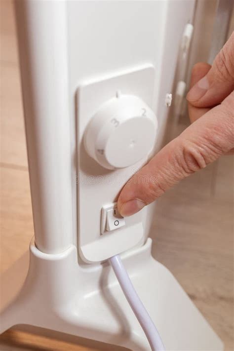 Energy Saving Switch Off Button Of The Electrical Appliance Finger On