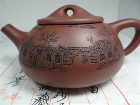 民興茶莊宜興紫砂壺正品滿瓢壺 工藝師王燦 立體刻繪滿刻 全手工製 原礦老清水泥 容量650cc9孔出水順暢 附 Yahoo拍賣