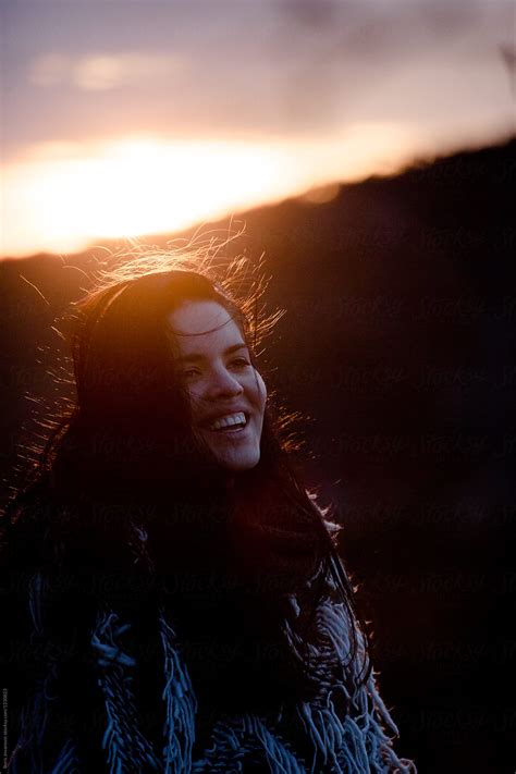 Portrait Of A Beautiful Black Haired Woman During Sunset By Stocksy
