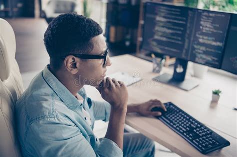 Photo Of Serious Programmer Young Man Working On Outsource Startup