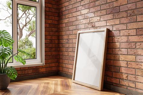 하나의 빈 캔버스 포스터는 벽에 기대어 조롱합니다 큰 창문을 통해 빛나는 밝은 일광 가정 장식 디자인 3d 그림 0명에 대한 스톡 사진 및 기타 이미지 Istock