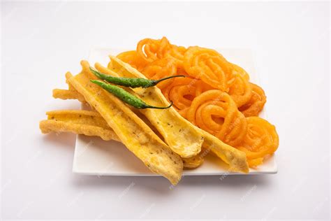 Premium Photo Crispy Fafda With Sweet Jalebi Is An Indian Snack Most