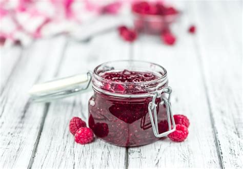 Premium Photo Fresh Made Raspberry Jam On A Rustic Background