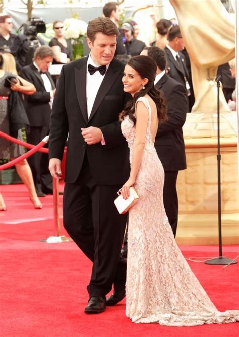 Nathan Fillion And Mikaela Hoover At The 2013 Emmys Nathan Fillion Emmy Awards Castle Tv Series