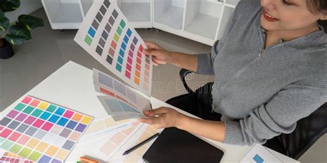 Graphic Designer Analyzing Color Samples At Desk Stock Image Image Of Project Creative 339563161