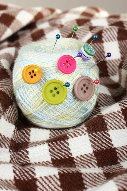 Premium Photo Ball Of Thread In The Buttons