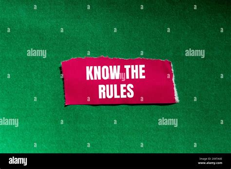 Know The Rules Words Written On Ripped Torn Pink Paper Piece On Green Background Conceptual