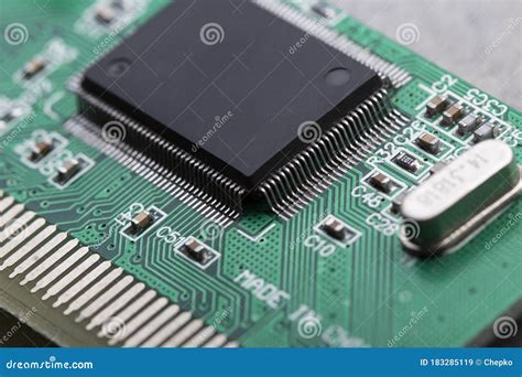 Computer Processor Chip On A Circuit Board With Microchips And Other