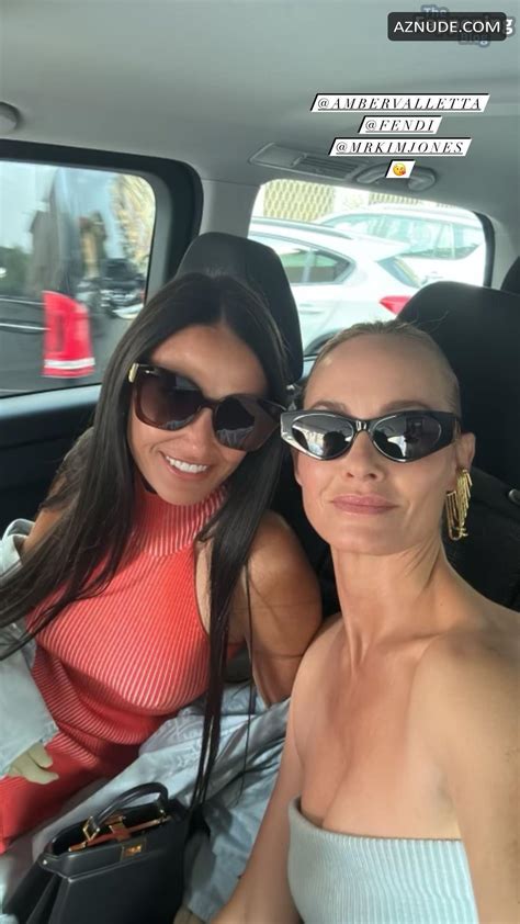 Demi Moore Flaunts Her Sexy Pokies At Milan Fashion Week AZNude