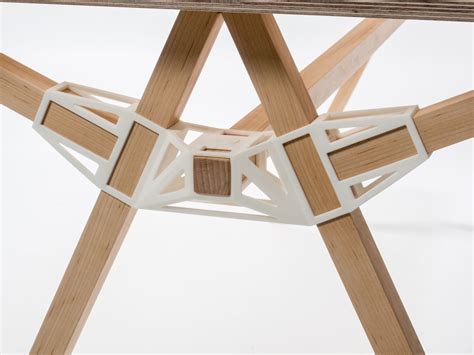A Close Up Of A Wooden Structure Made Out Of Wood And White Plastic