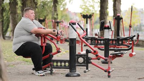 Tired Fat Overweight Man Resting After Doing Sports In The Park Fat