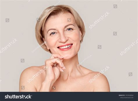 Naked Mature Blonde Woman Standing Isolated Stock Photo 1767638360