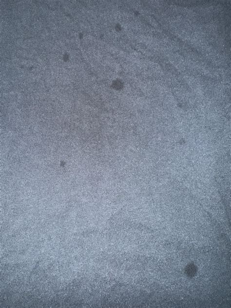 Why Do I Get These Random Wet Looking Spots On Clothes After Washing