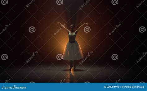 Flexible Ballerina Dancing On Tiptoe On Stage Ballet Dancer Wearing