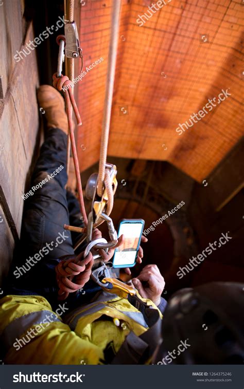Person Wearing Helmet Using Mobile At Site Images Stock Photos Vectors Shutterstock