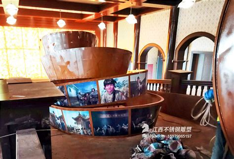 赣州方特不锈钢电影胶卷雕塑 江西赣州不锈钢雕塑江西赣州铁艺工程江西赣州铜雕塑江西赣州玻璃钢雕塑厂家设计公司