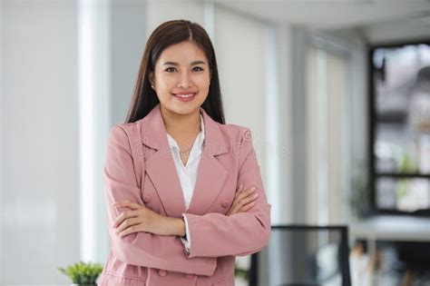 Portrait Successful Businesswoman Leader In Suit Standing In Office