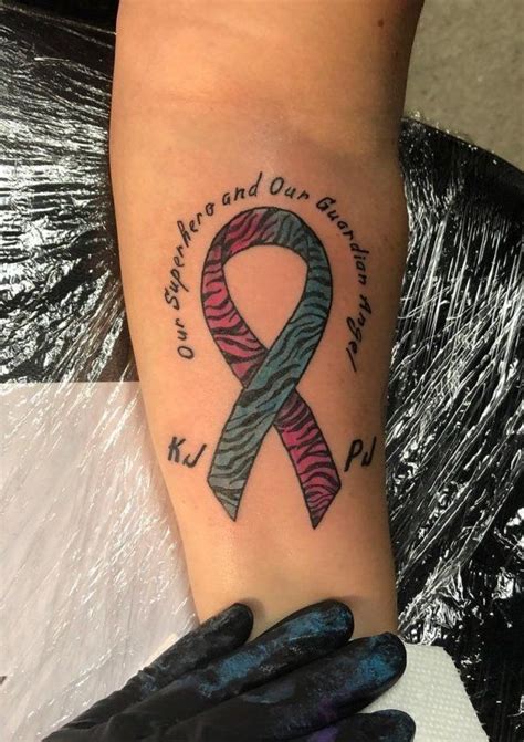 Cancer Ribbon Tattoo Ideas That Inspire Hope And Empowerment 0 Photos