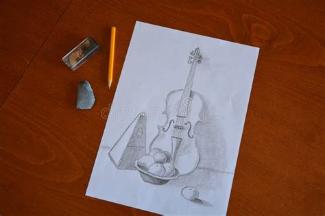A Monochrome Drawing On A Table With A Pencil A Sharpener And An
