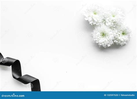 Funeral Symbols White Flower Near Black Ribbon On White Background Top