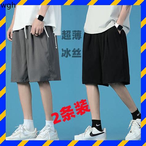 กางเกงขาสั้2565 ซื้อกางเกงขาสั้นกีฬาหนึ่งอันและหนึ่งกางเกงในฤดูร้อนของผู้ชายบาง ๆ หลวมกลาง พันท