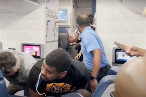 Delta Passengers Crew Subdued Off Duty Flight Attendant