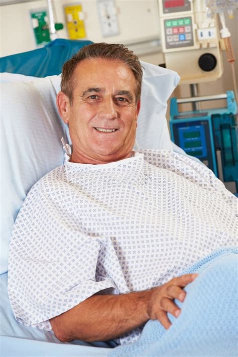 Portrait Of Male Patient Relaxing In Hospital Bed Stock Image Image 28706341