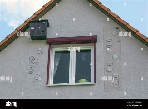 Nesting Aids For Swifts And Bats On A House Facade Under The Roof