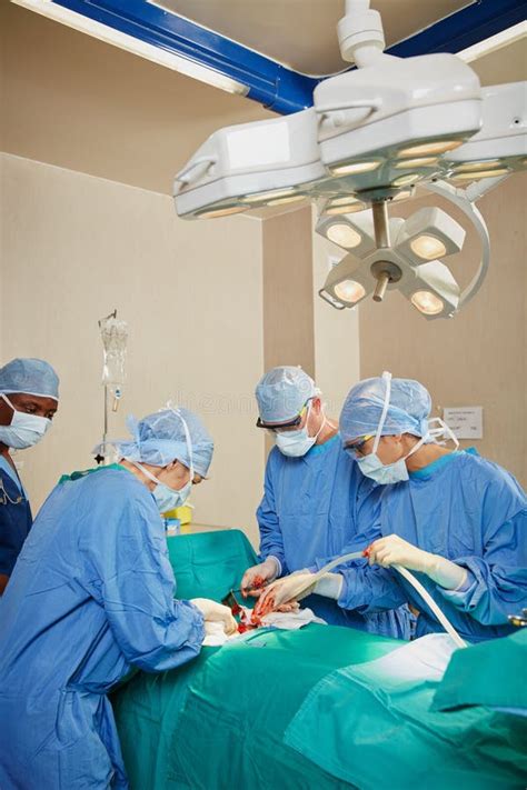 Its A Medical Emergency A Team Of Surgeons Performing A Surgery In An