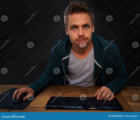 Working On A New Game A Young Programmer Focused On His Work Stock
