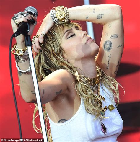Miley Cyrus Displays New Freedom Hand Tattoo Amid Ongoing Divorce And