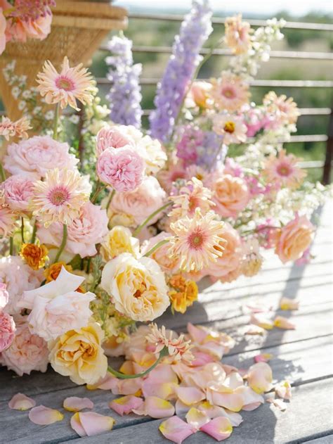 Blush Lavender And Pale Yellow Flower Arrangements At Ceremony Altar