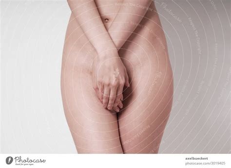 Naked Woman Covers Her Shame With Her Hands A Royalty Free Stock Photo From Photocase
