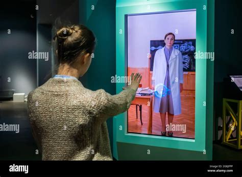 Woman Using Interactive Touchless Display Kiosk With No Touch Control Technology Stock Photo Alamy