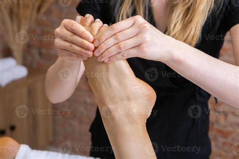 Young Woman Getting A Back Massage In A Spa Salon Beauty Treatment