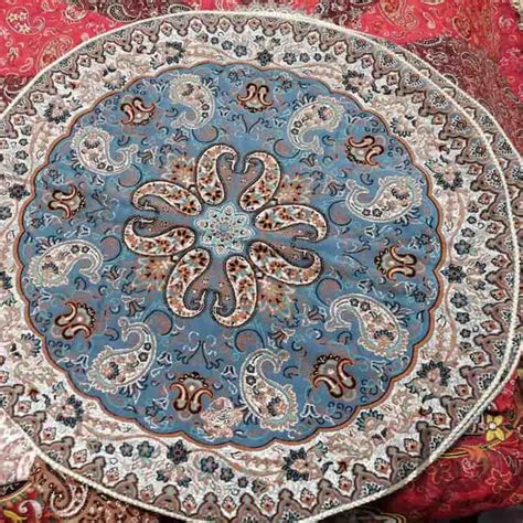 ترمه گرد؛ الیاف ابریشم قرمز نارنجی مشکی 2 طرح بته جقه شاخ گوزنی آراد