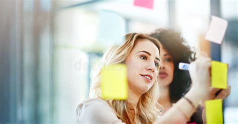 Business Women Team Writing And Glass Board For Startup Planning