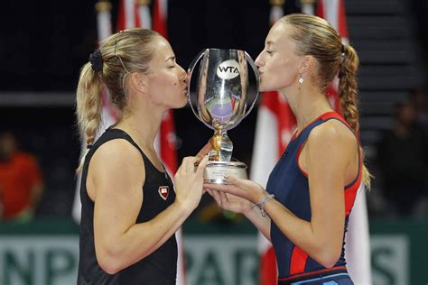 Download Timea Babos Kissing Wta Cup Wallpaper