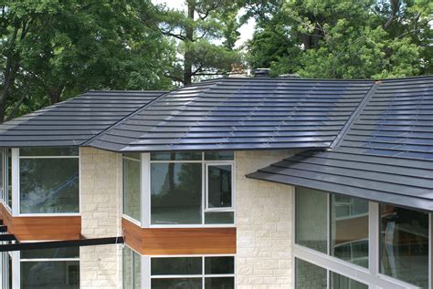 Meet The Men Who Put Solar Shingles On The Roof